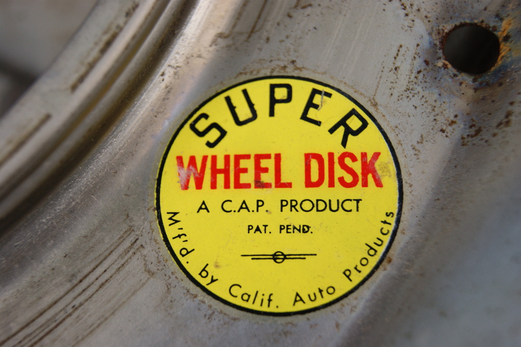 Photo: Duvallwheelcoverlogo | George DuVall Swirl flipper hubcap album ...